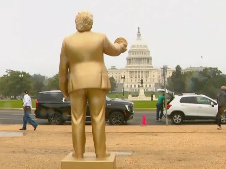 Golden Trump statue with Bitcoin was installed outside Capitol before ...